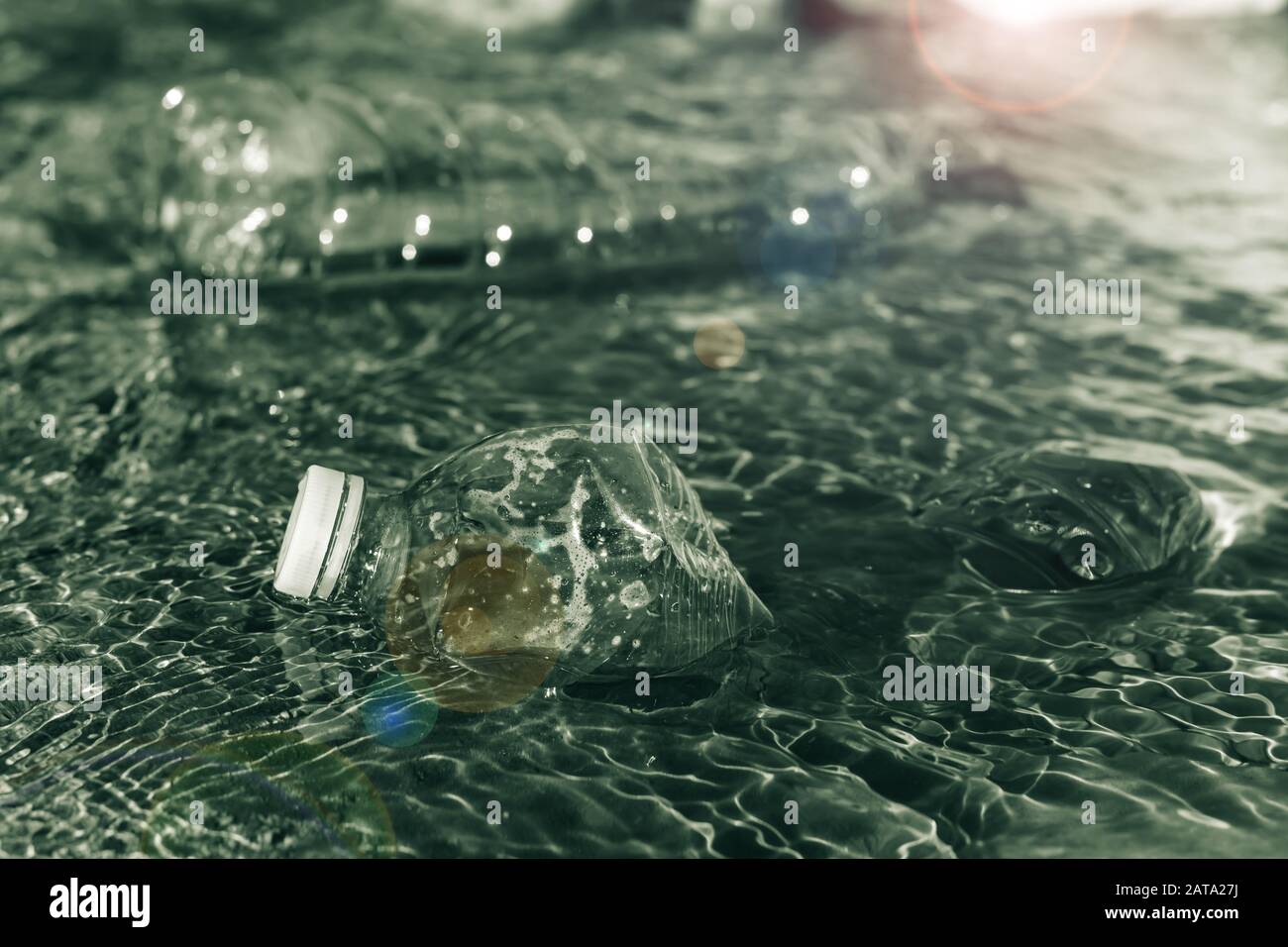 Floating plastic bottles hi-res stock photography and images - Alamy