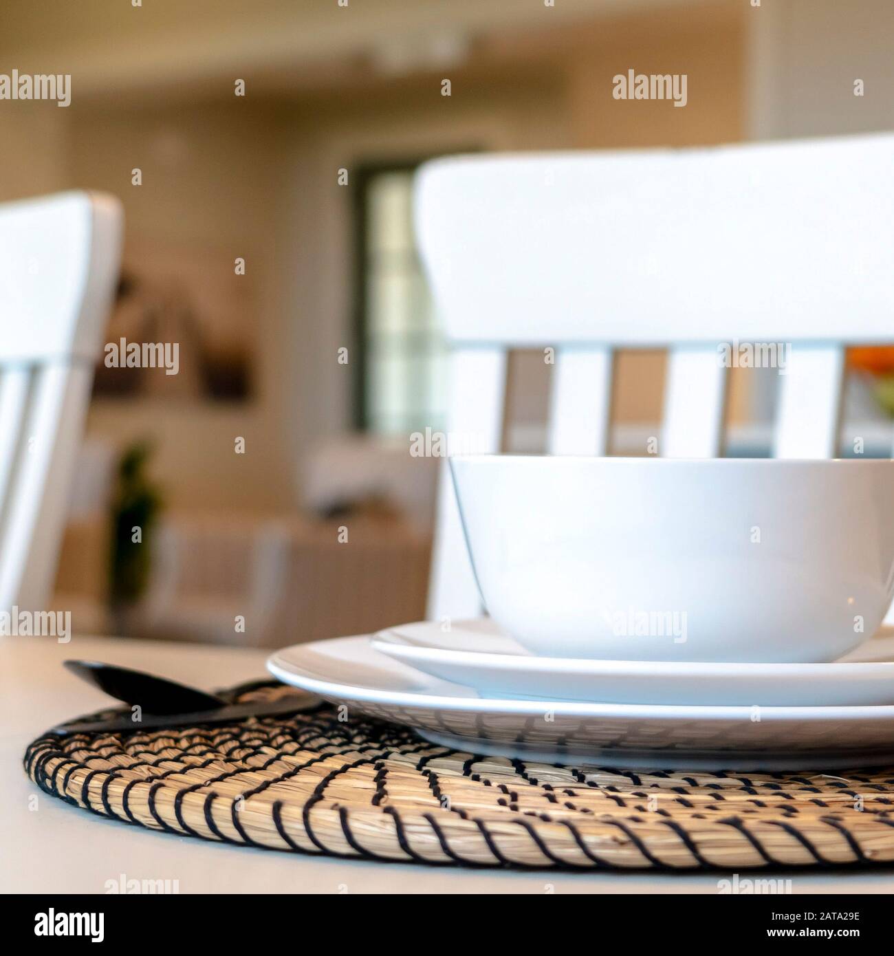 Square frame Table setting on family dining table with white tableware ...