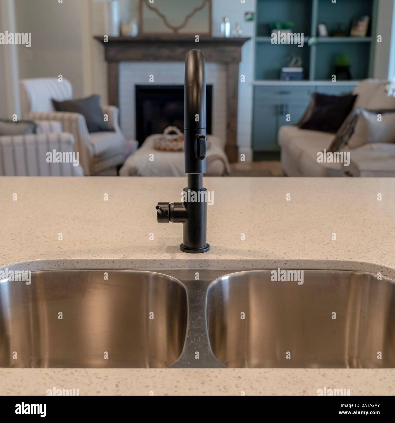 Square frame Undermount sink with double bowl and black faucet at the ...