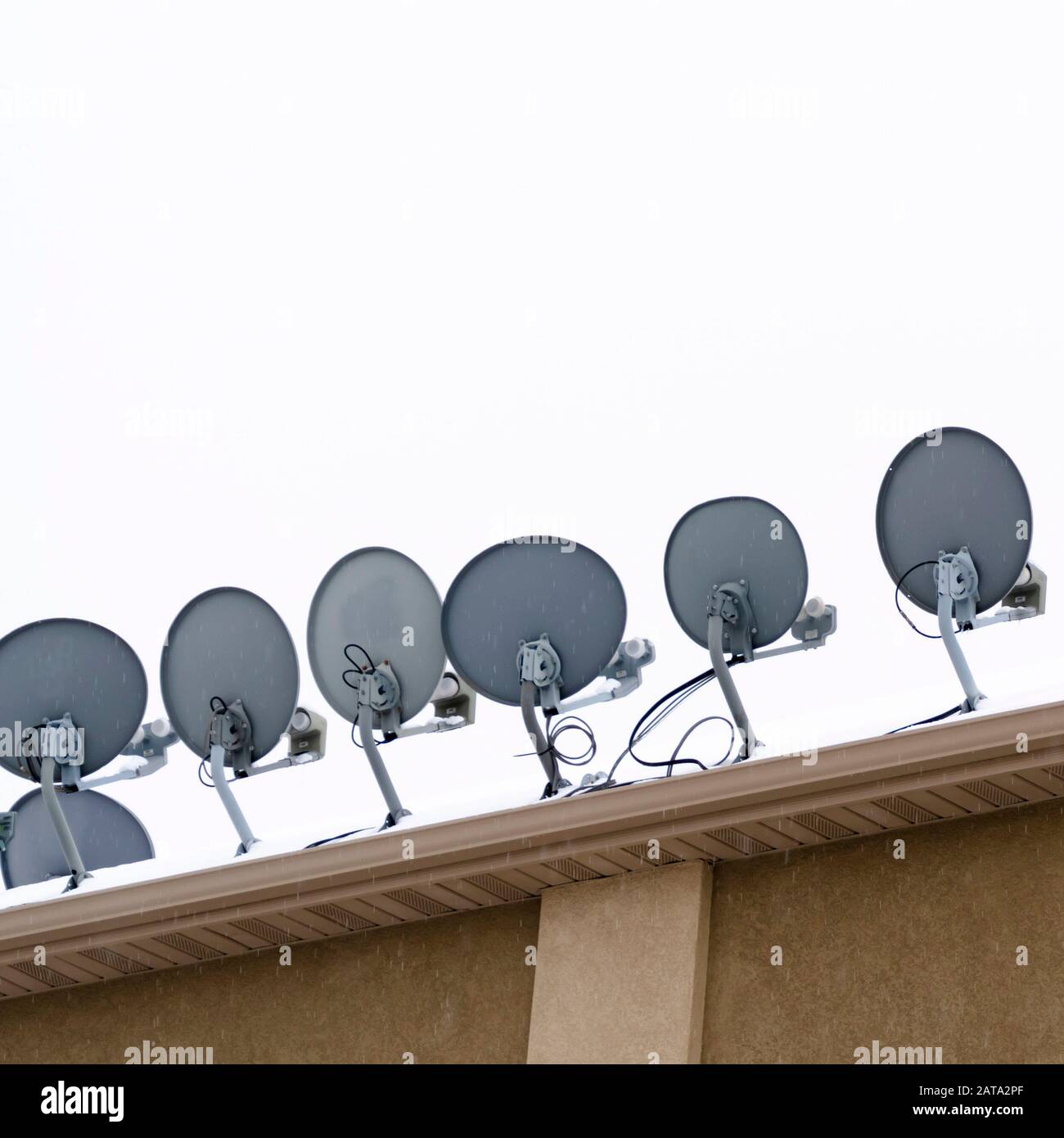 Square frame Satellite dishes installed on roof of residential building ...