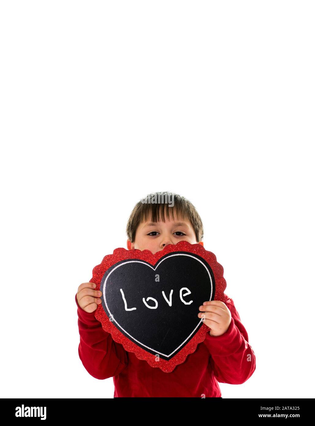 cute little boy holding heart with love on valentines day Stock Photo ...