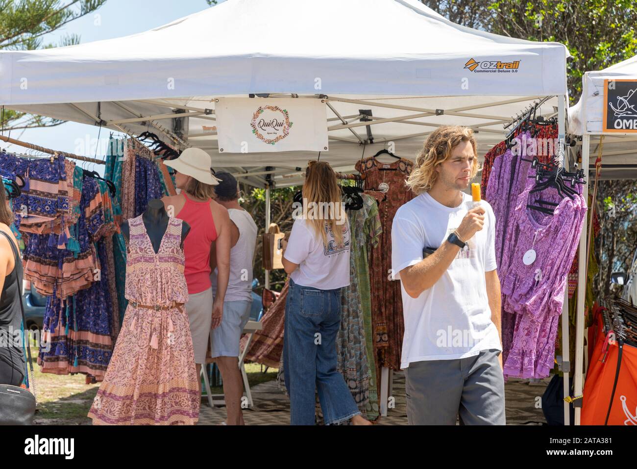 Byron Bay market day, people browsing womens clothing at a stall,Byron ...