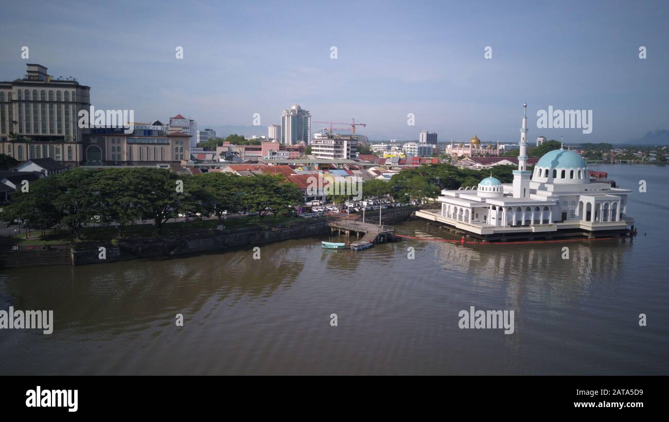 Aerial view of the Kuching city area, with the rivers, bridges, hills ...