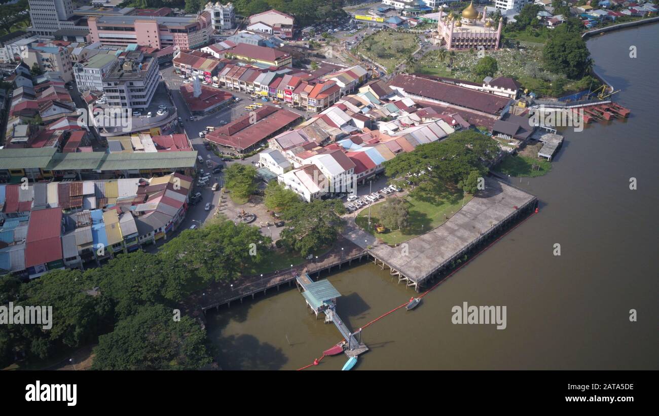 Aerial view of the Kuching city area, with the rivers, bridges, hills ...