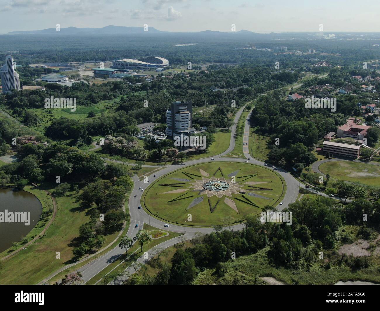 Aerial view of the Kuching city area, with the rivers, bridges, hills ...