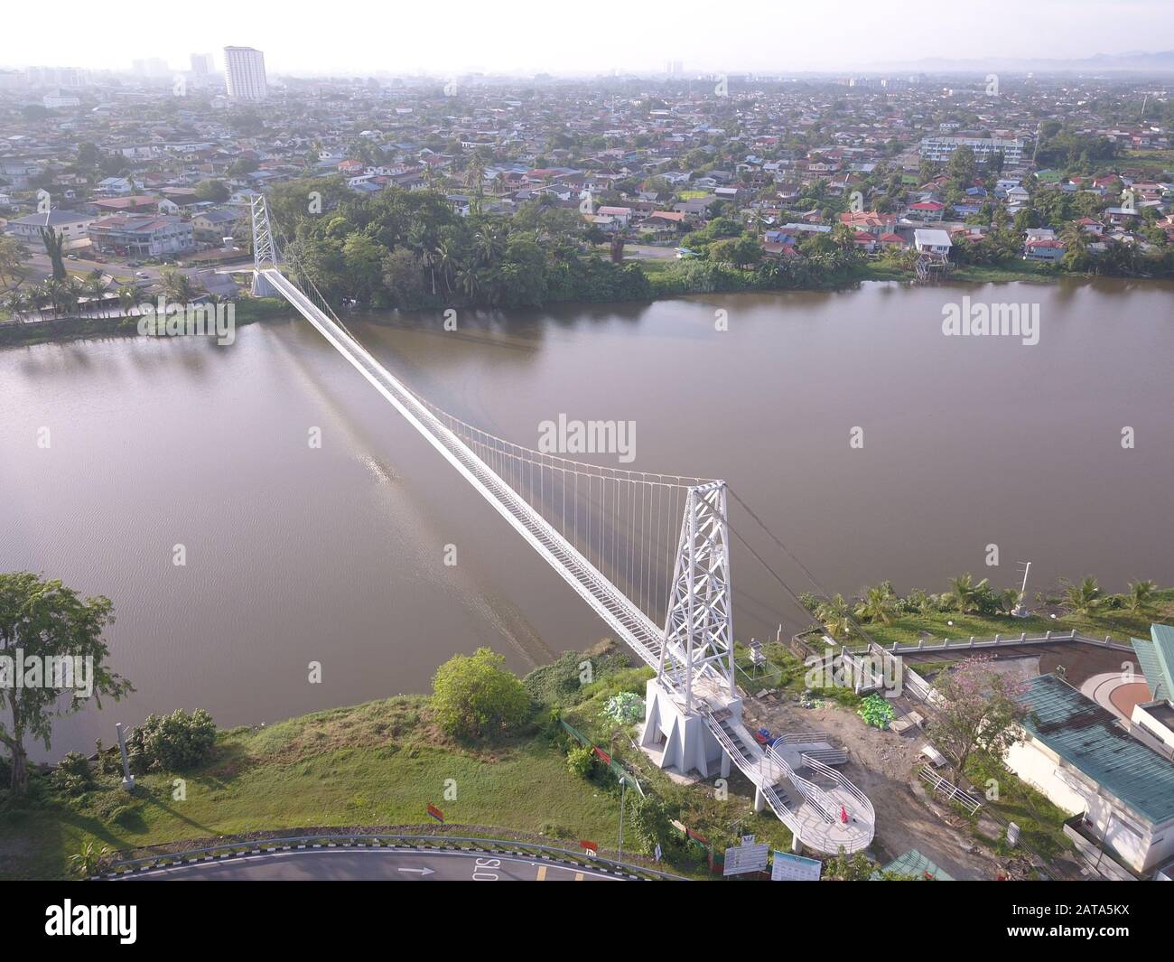 Aerial view of the Kuching city area, with the rivers, bridges, hills ...
