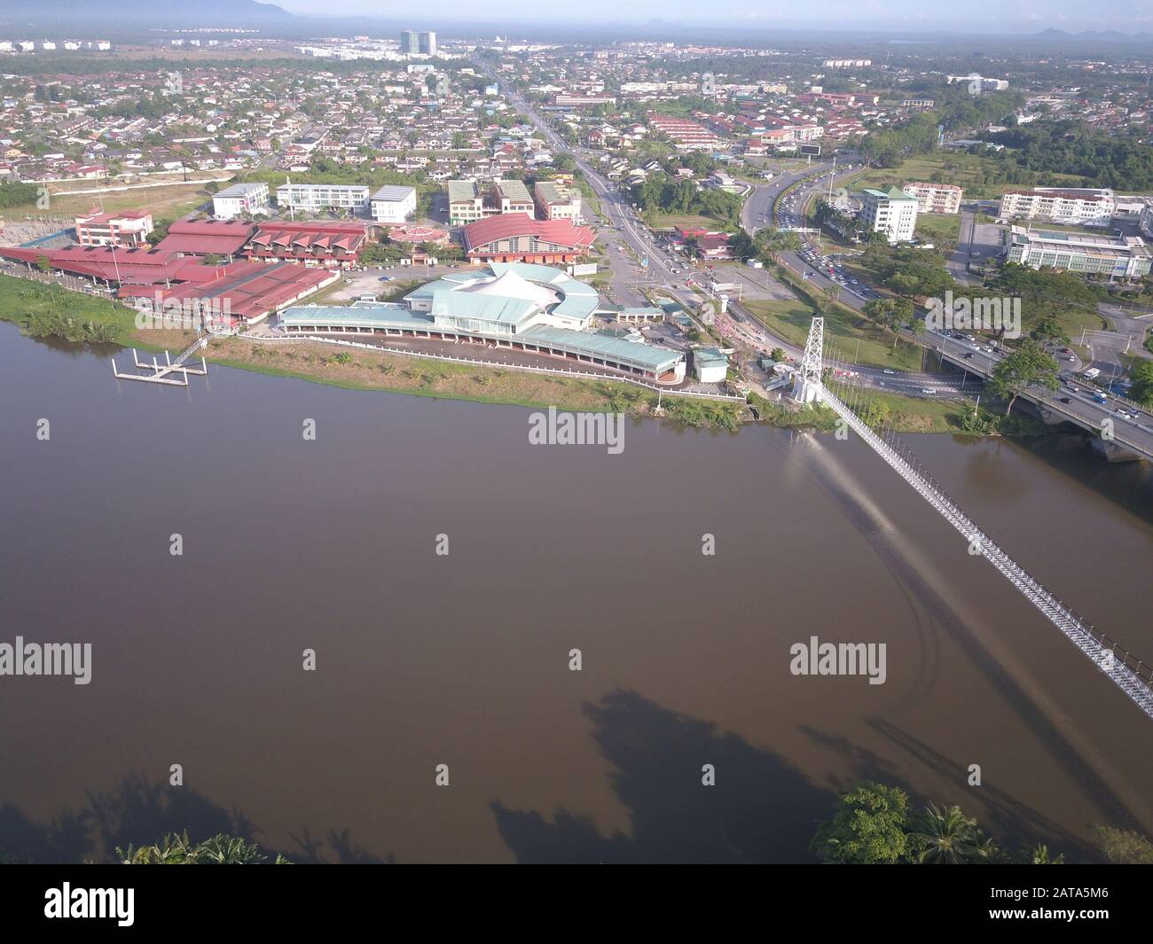 Aerial view of the Kuching city area, with the rivers, bridges, hills ...