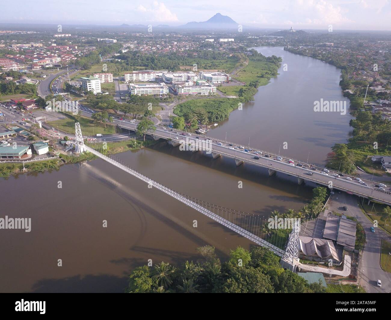 Aerial view of the Kuching city area, with the rivers, bridges, hills ...