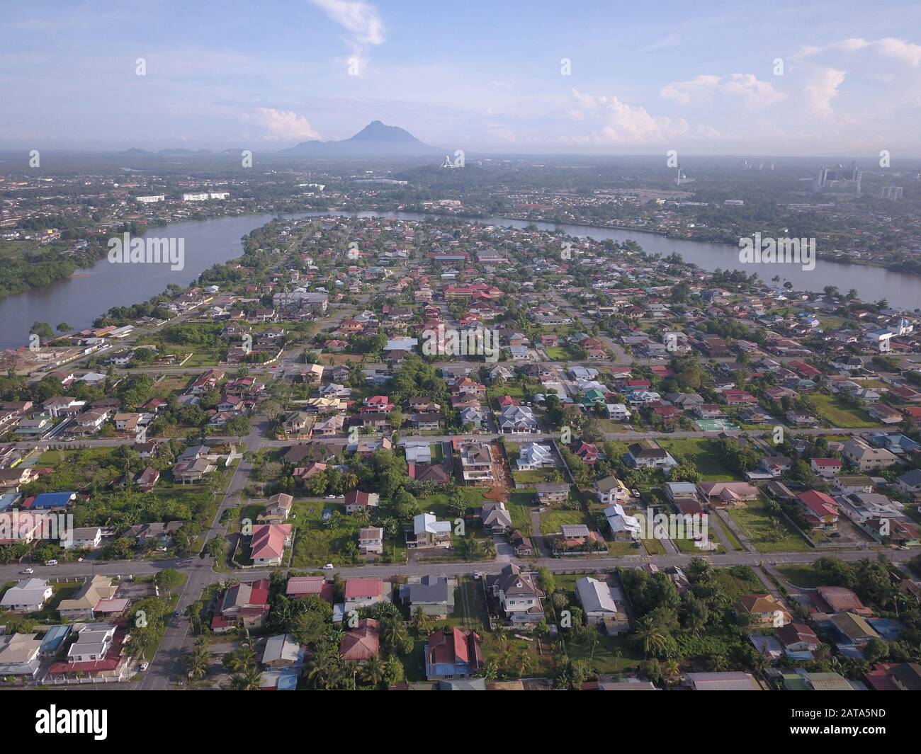 Aerial view of the Kuching city area, with the rivers, bridges, hills ...