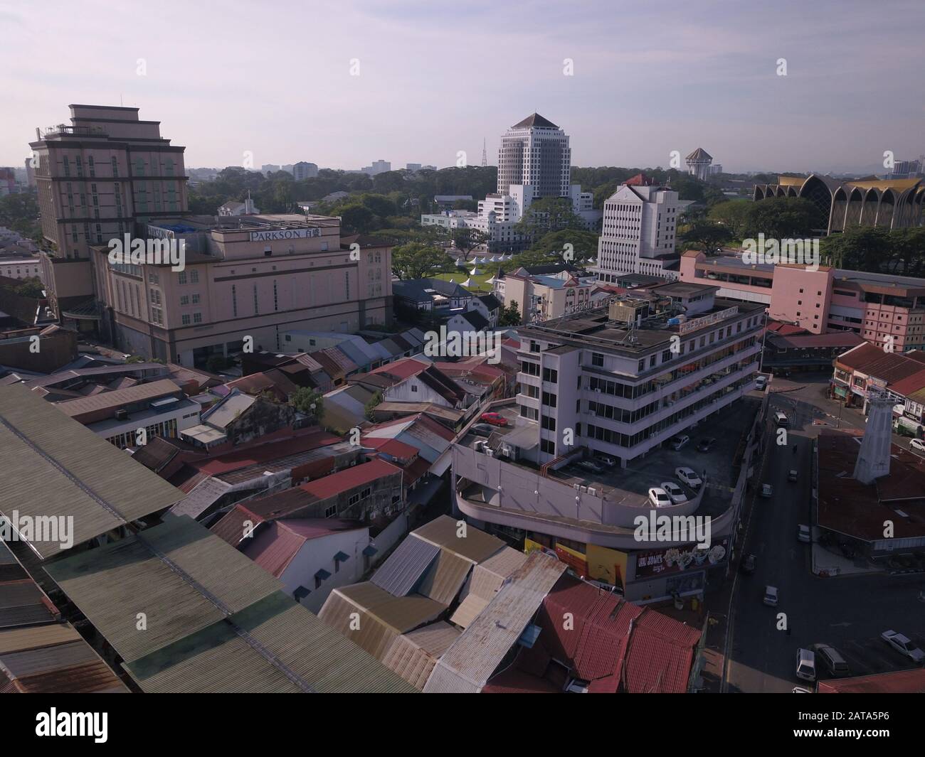 Aerial view of the Kuching city area, with the rivers, bridges, hills ...