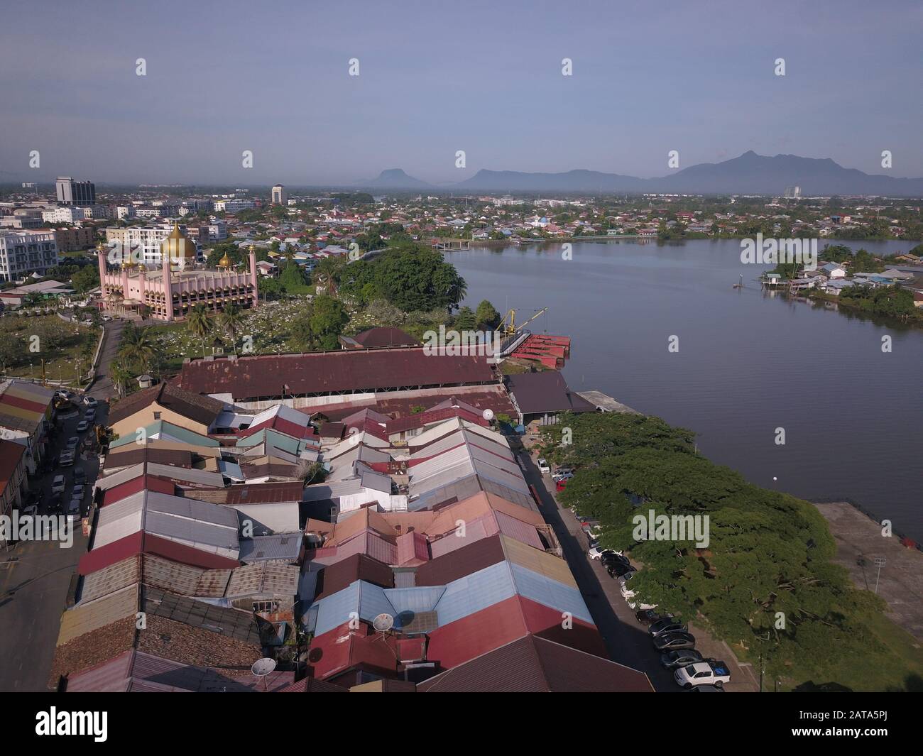 Aerial view of the Kuching city area, with the rivers, bridges, hills ...