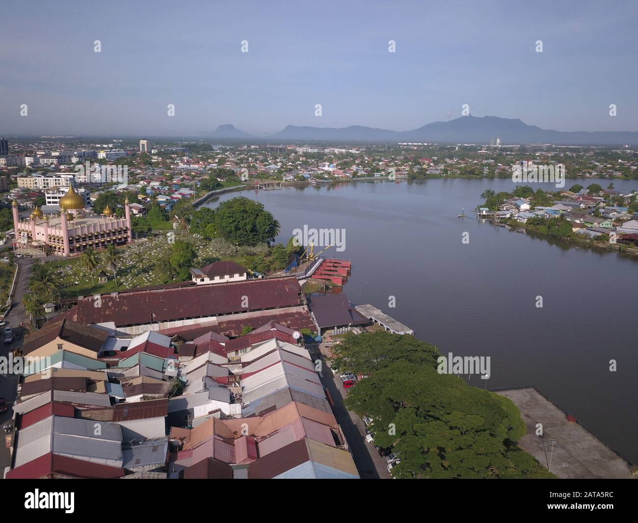 Aerial view of the Kuching city area, with the rivers, bridges, hills ...