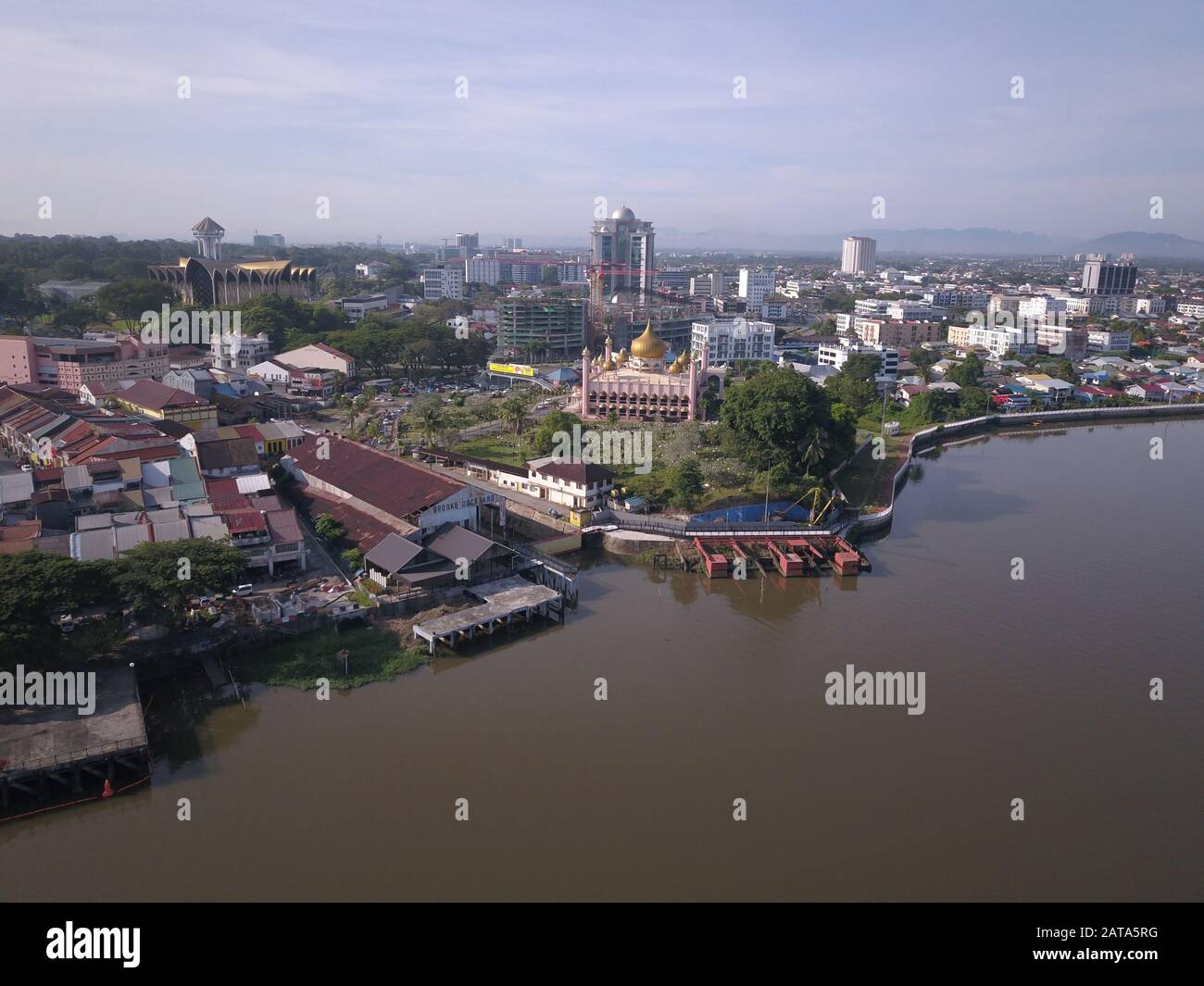 Aerial view of the Kuching city area, with the rivers, bridges, hills ...
