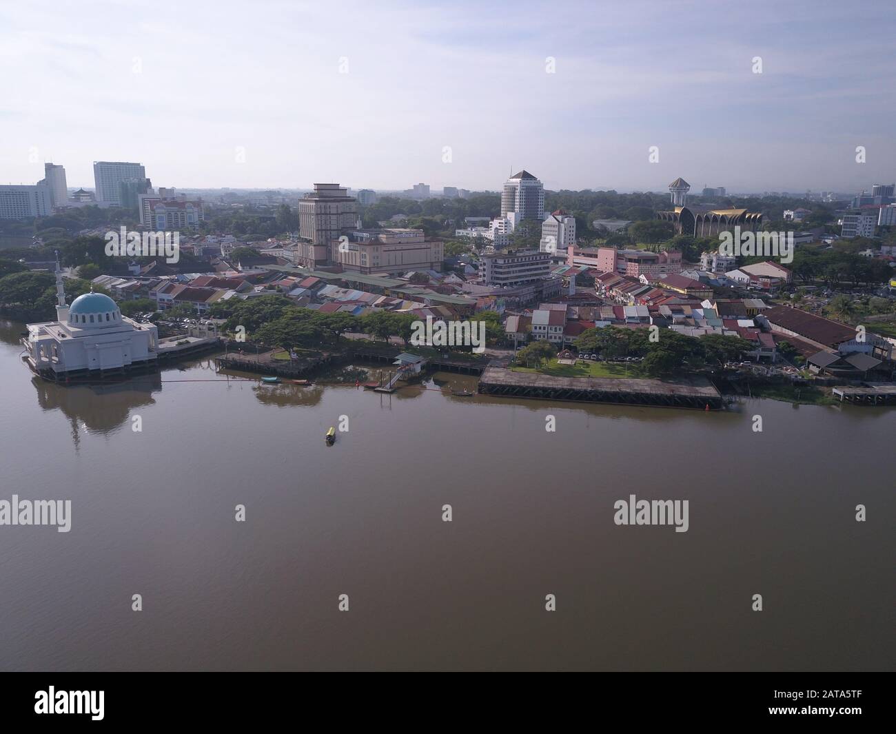 Aerial view of the Kuching city area, with the rivers, bridges, hills ...