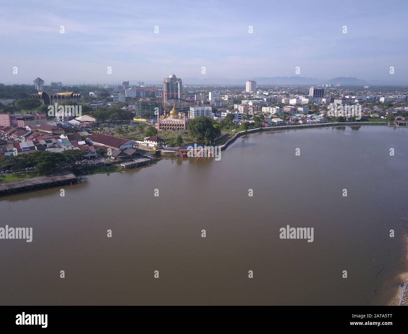 Aerial view of the Kuching city area, with the rivers, bridges, hills ...