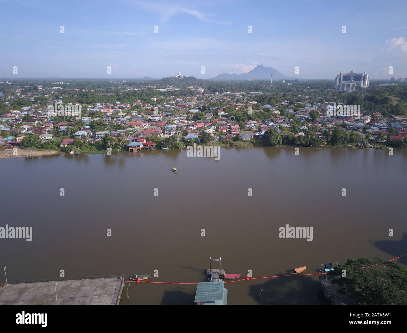 Aerial view of the Kuching city area, with the rivers, bridges, hills ...