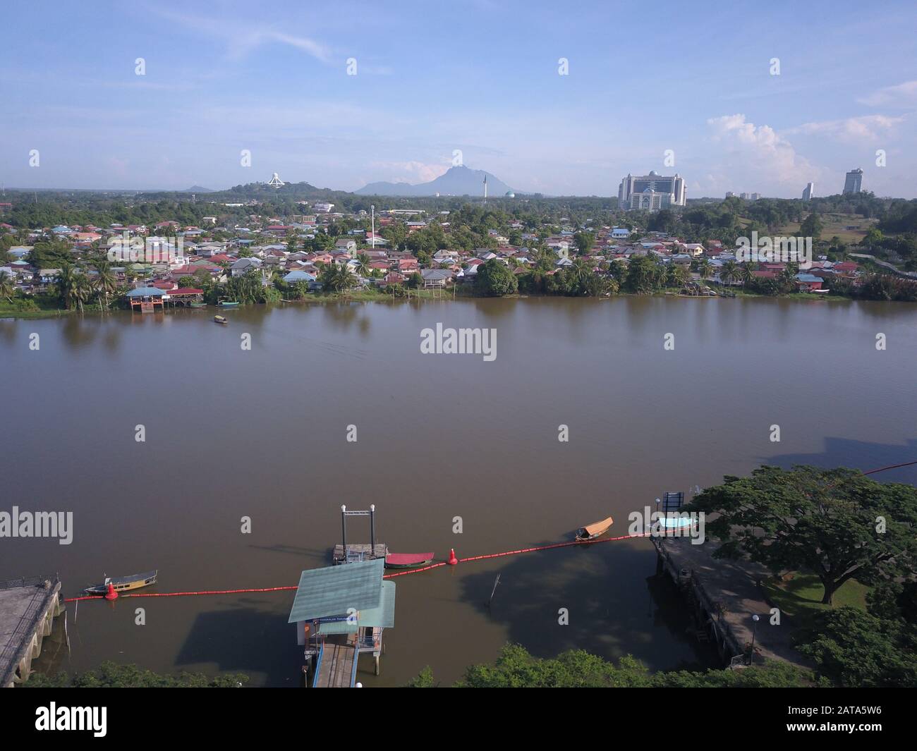 Aerial view of the Kuching city area, with the rivers, bridges, hills ...
