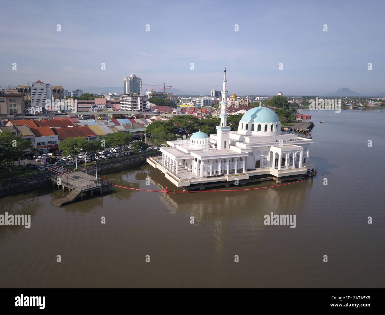 Aerial view of the Kuching city area, with the rivers, bridges, hills ...