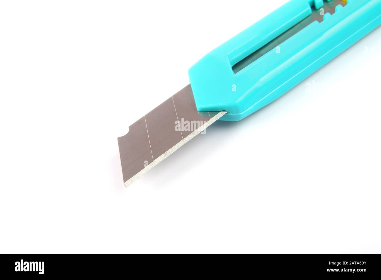 Paper cutter isolated on white background Stock Photo - Alamy