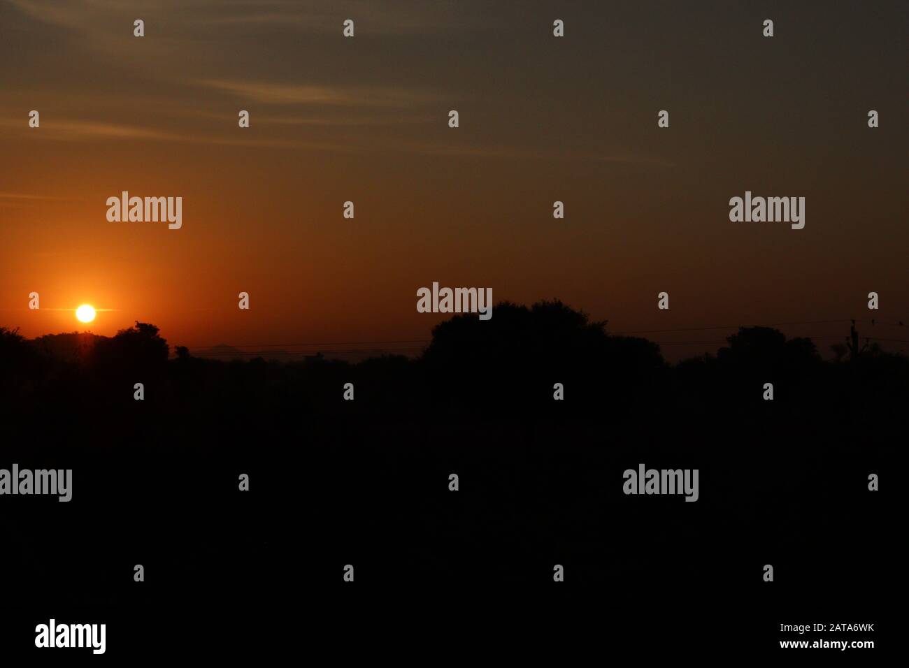 Indian village sunset silhouette hi-res stock photography and images ...