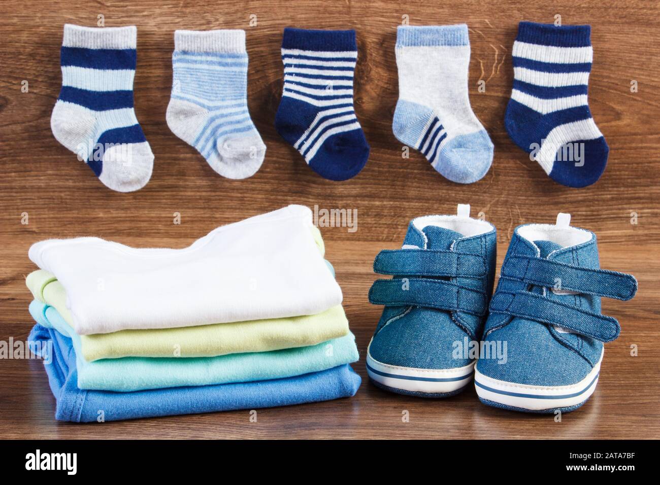 Stack of clothing for baby boy, expecting for kids and extending family ...