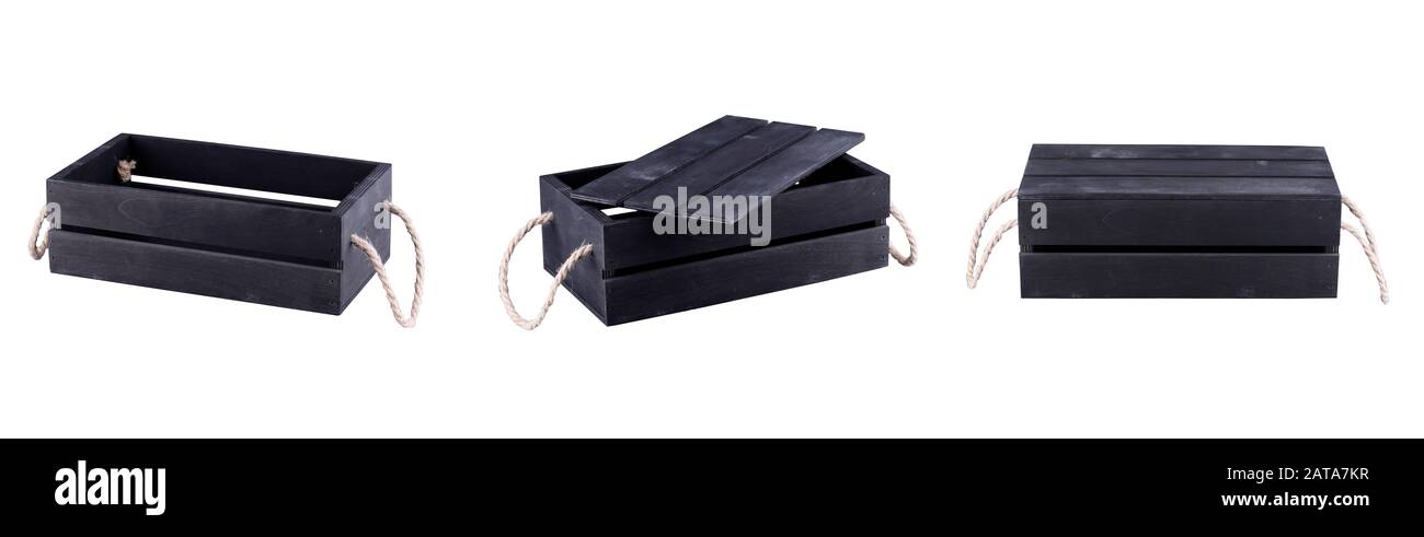 Three black wooden crates. A step of three boxes open half open and ...