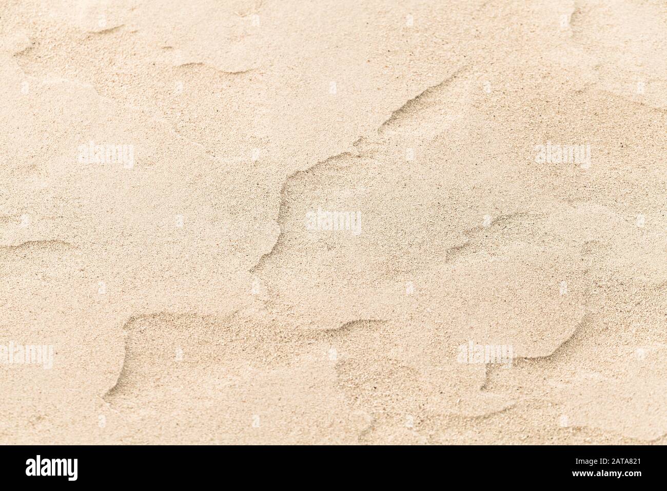 Sand ripples on the beach, close-up photo. Abstract natural background ...