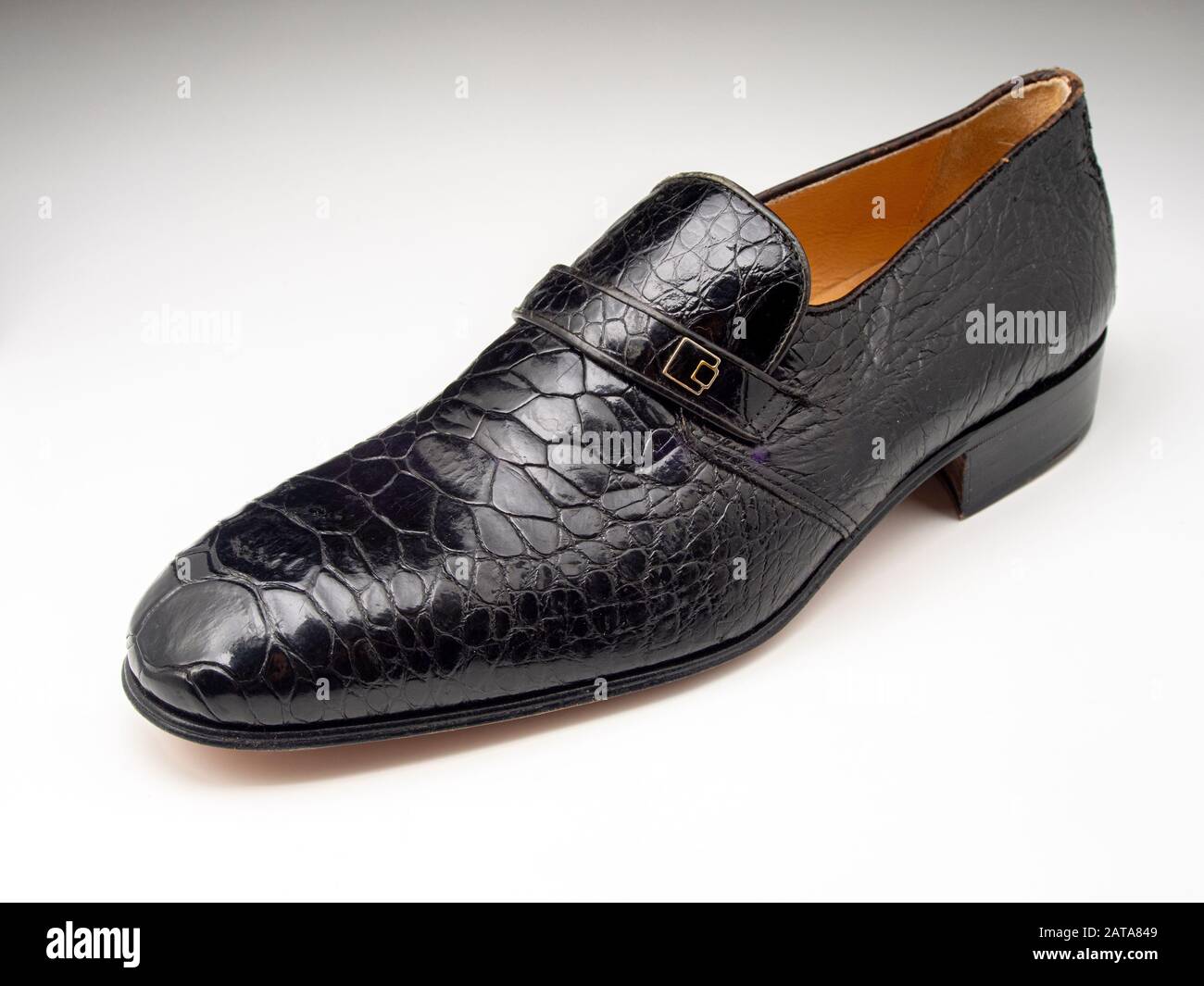 Black leather dress shoe made from sea turtle skin. Isolated. All sea ...