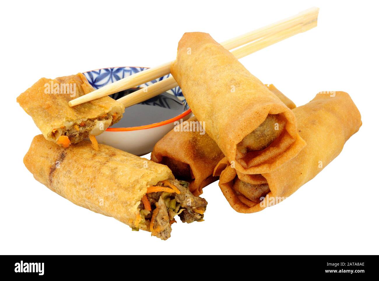 Chinese crispy duck filled spring rolls with soy sauce dip isolated on ...
