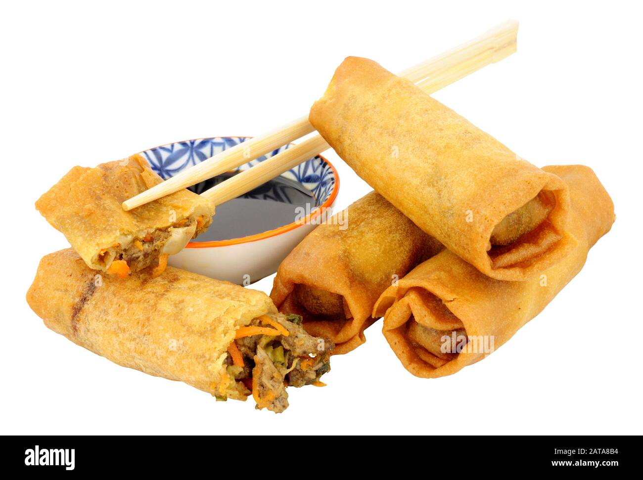 Chinese crispy duck filled spring rolls with soy sauce dip isolated on ...