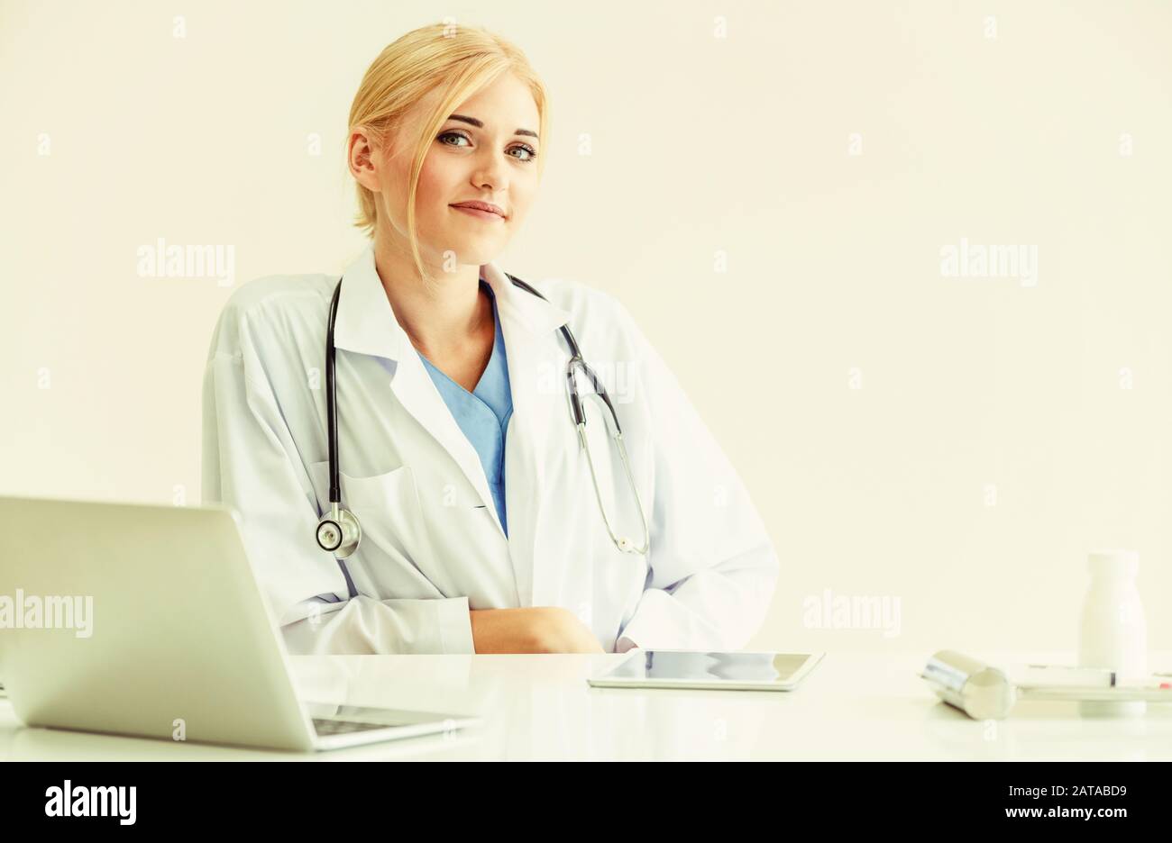 Woman doctor in hospital or healthcare institute working on medical ...