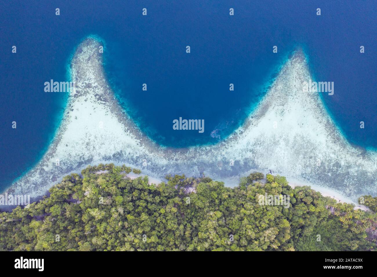 Seen from above, the many tropical islands within Raja Ampat, Indonesia ...