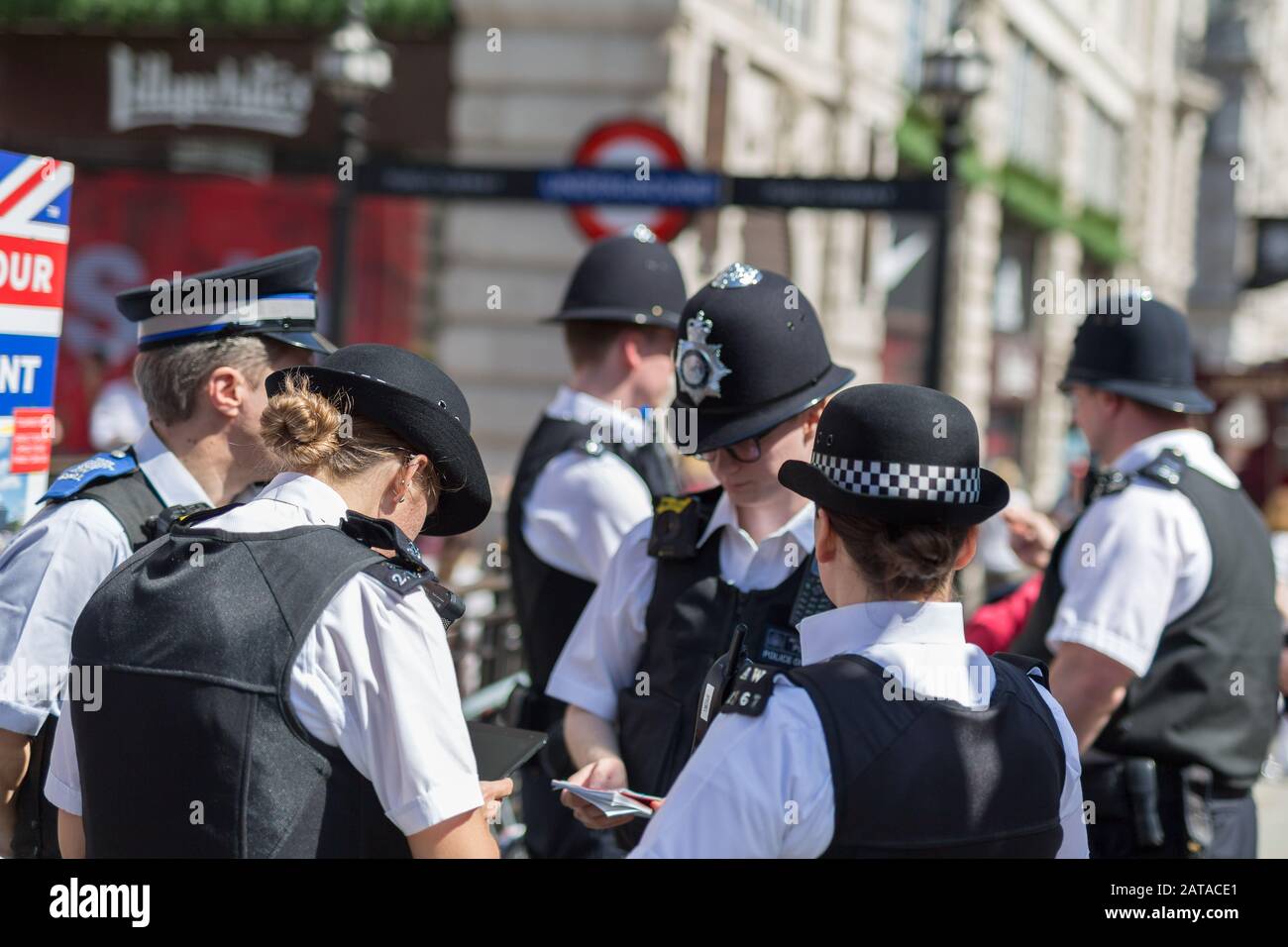 Street Photography: Group of London Policemen with Their Uniform Stock ...