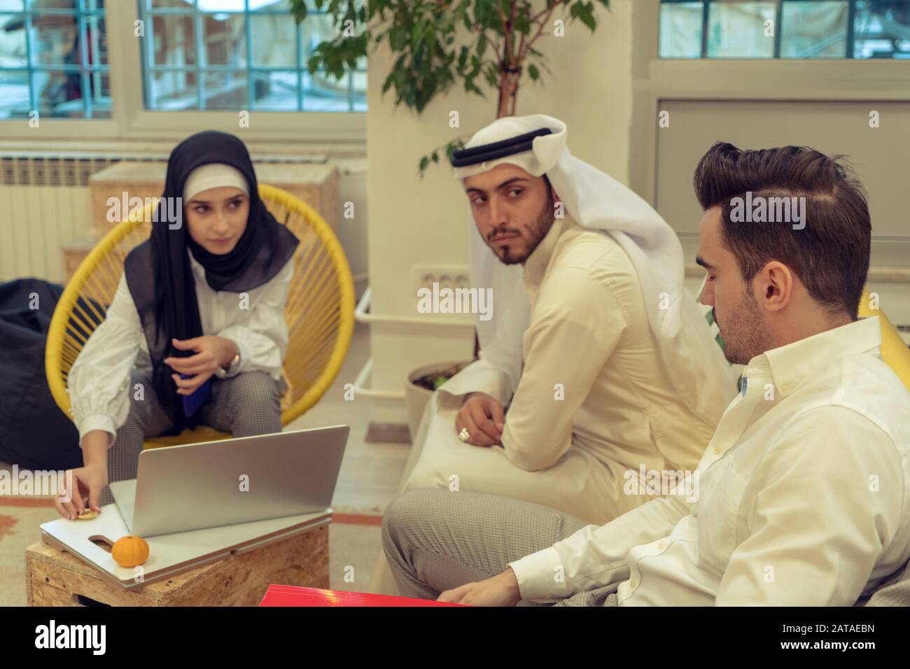 Arab business people in a meeting Stock Photo - Alamy