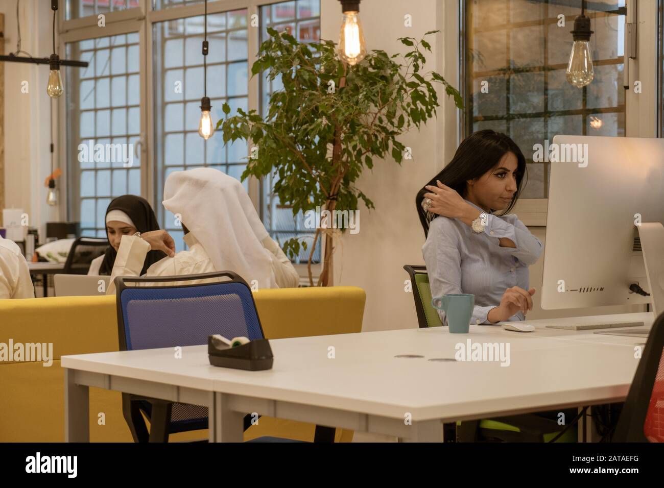 Arab business people in a meeting Stock Photo - Alamy