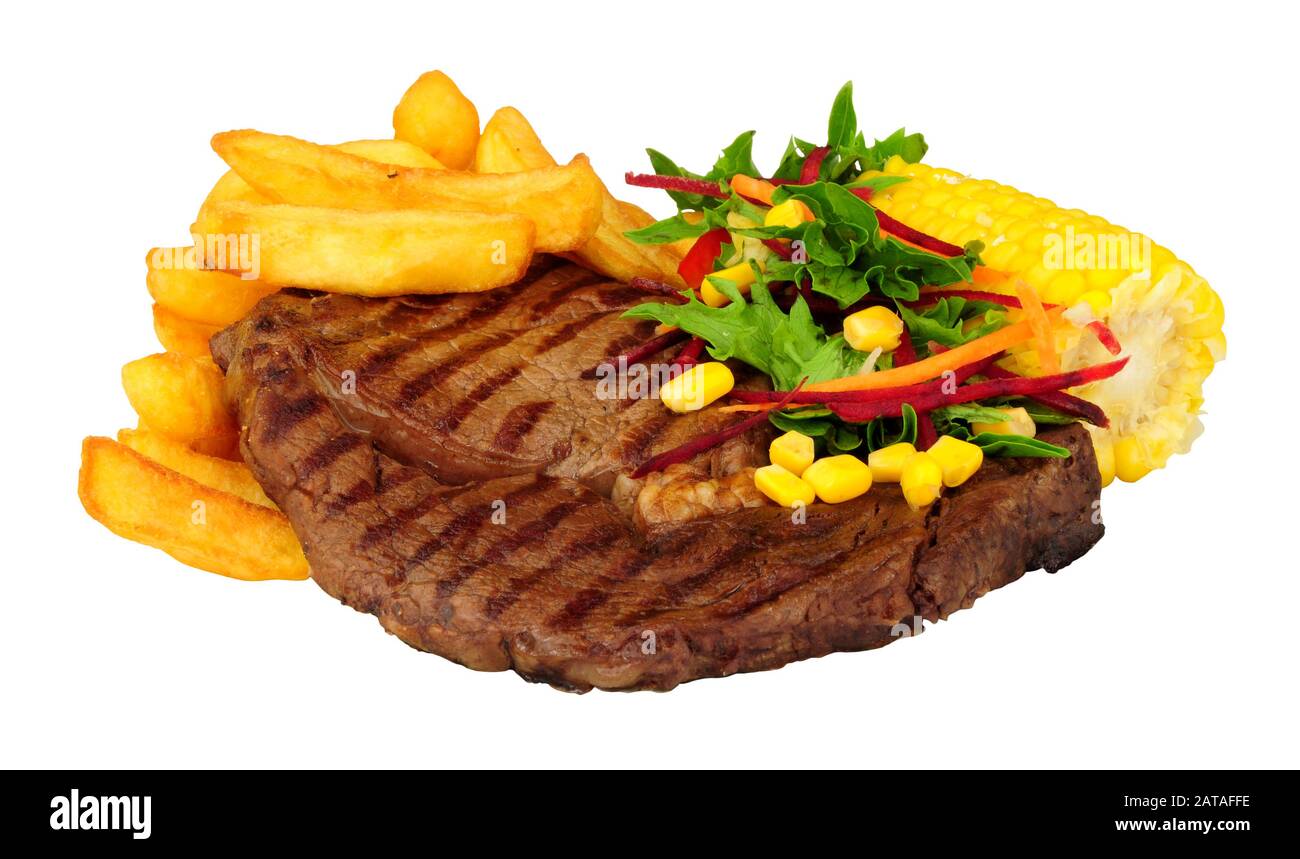 Grilled rib eye steak and chips meal with salad and sweetcorn cob ...