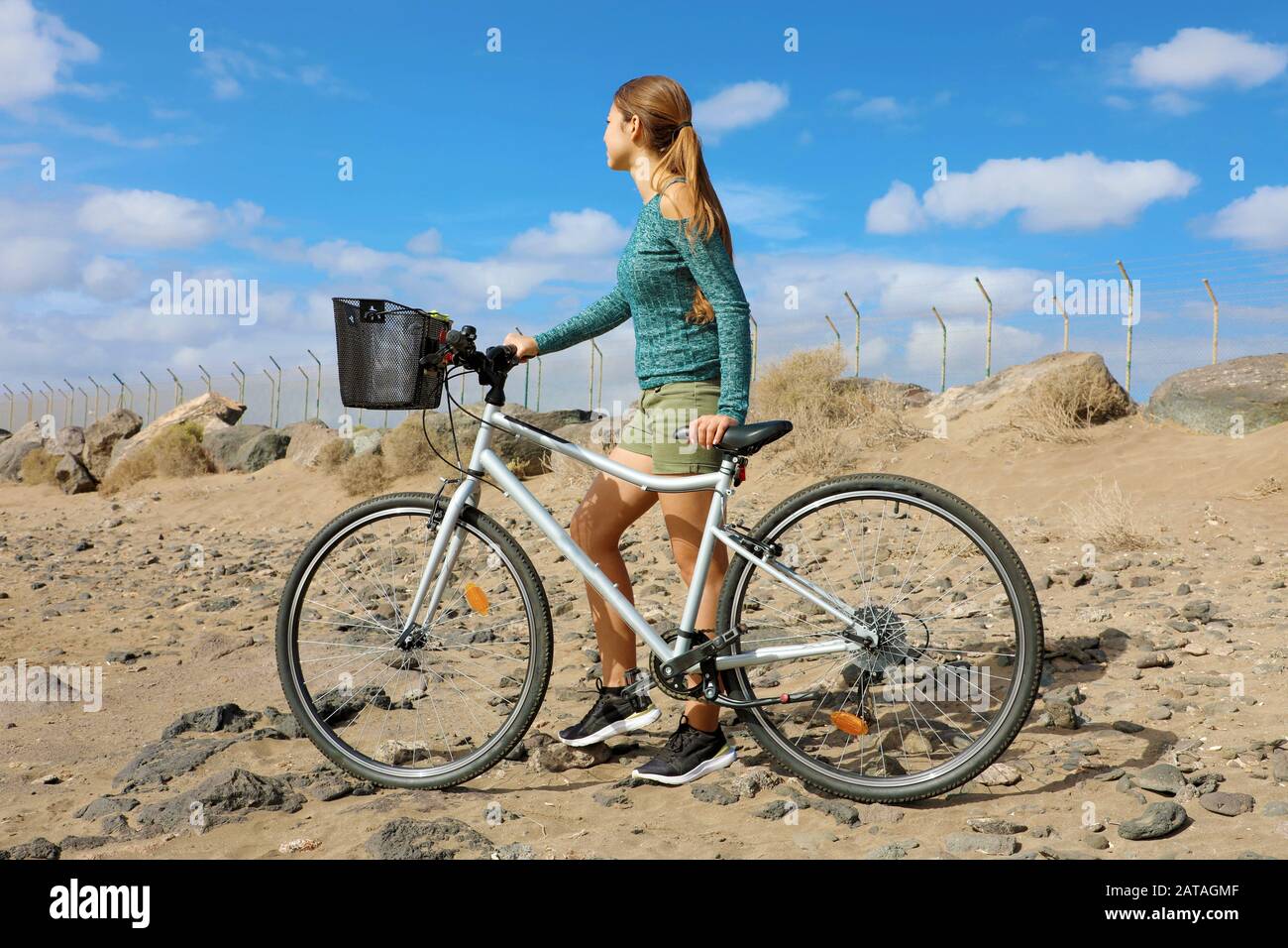 Back view of girl on bike hi-res stock photography and images - Alamy