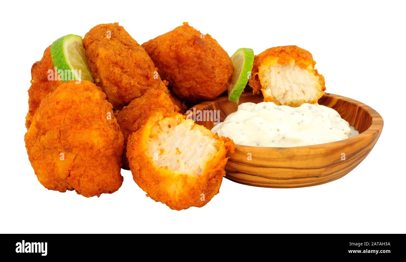 Chicken pakoras with raita dip in a wooden bowl isolated on a white ...