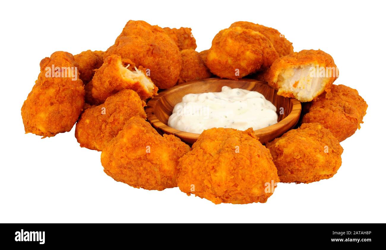 Chicken pakoras with raita dip in a wooden bowl isolated on a white ...