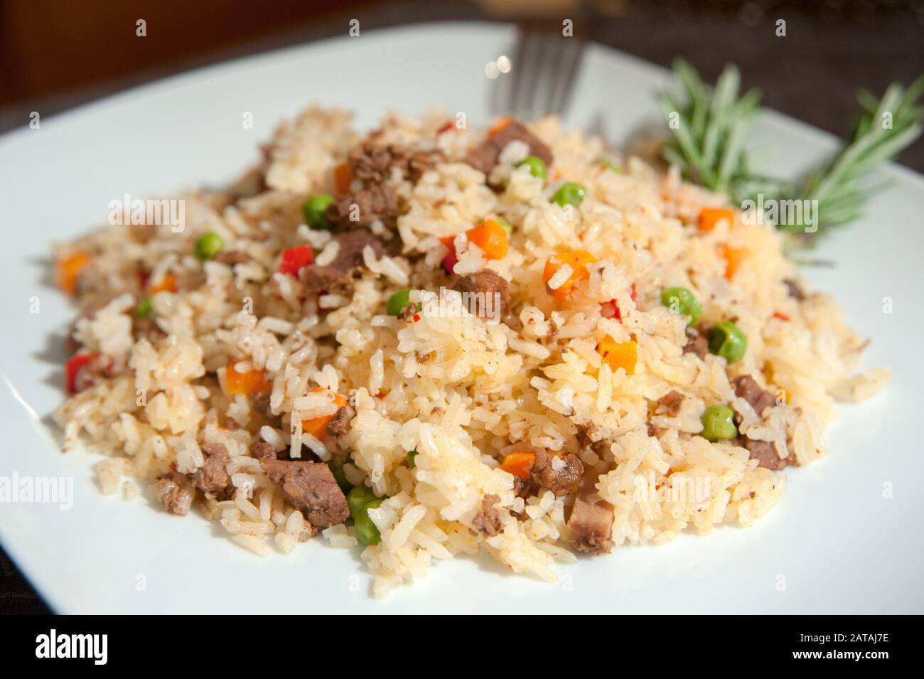 Rice pilaf with meat and vegetables Stock Photo - Alamy