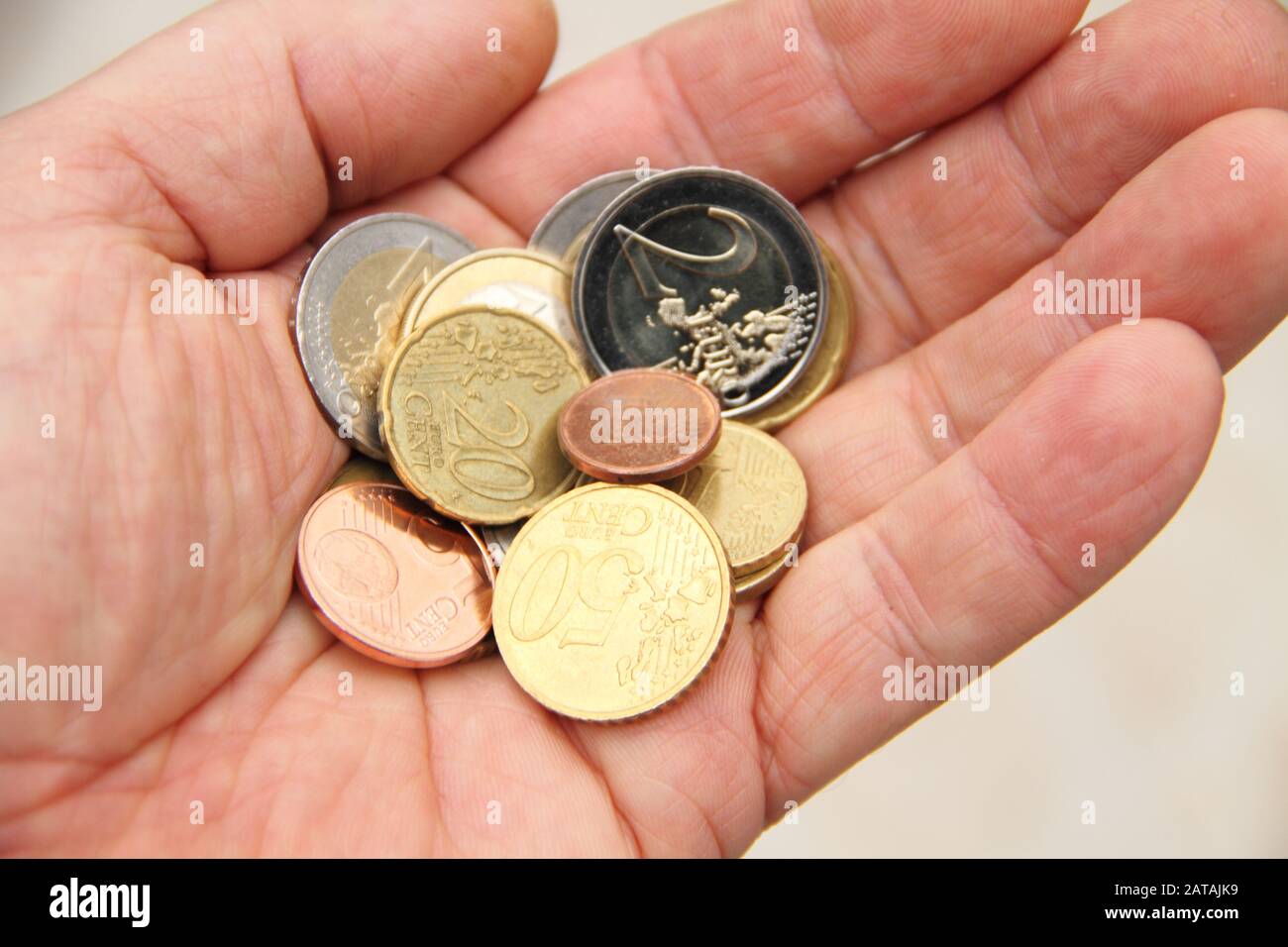 Handful loose change hi-res stock photography and images - Alamy
