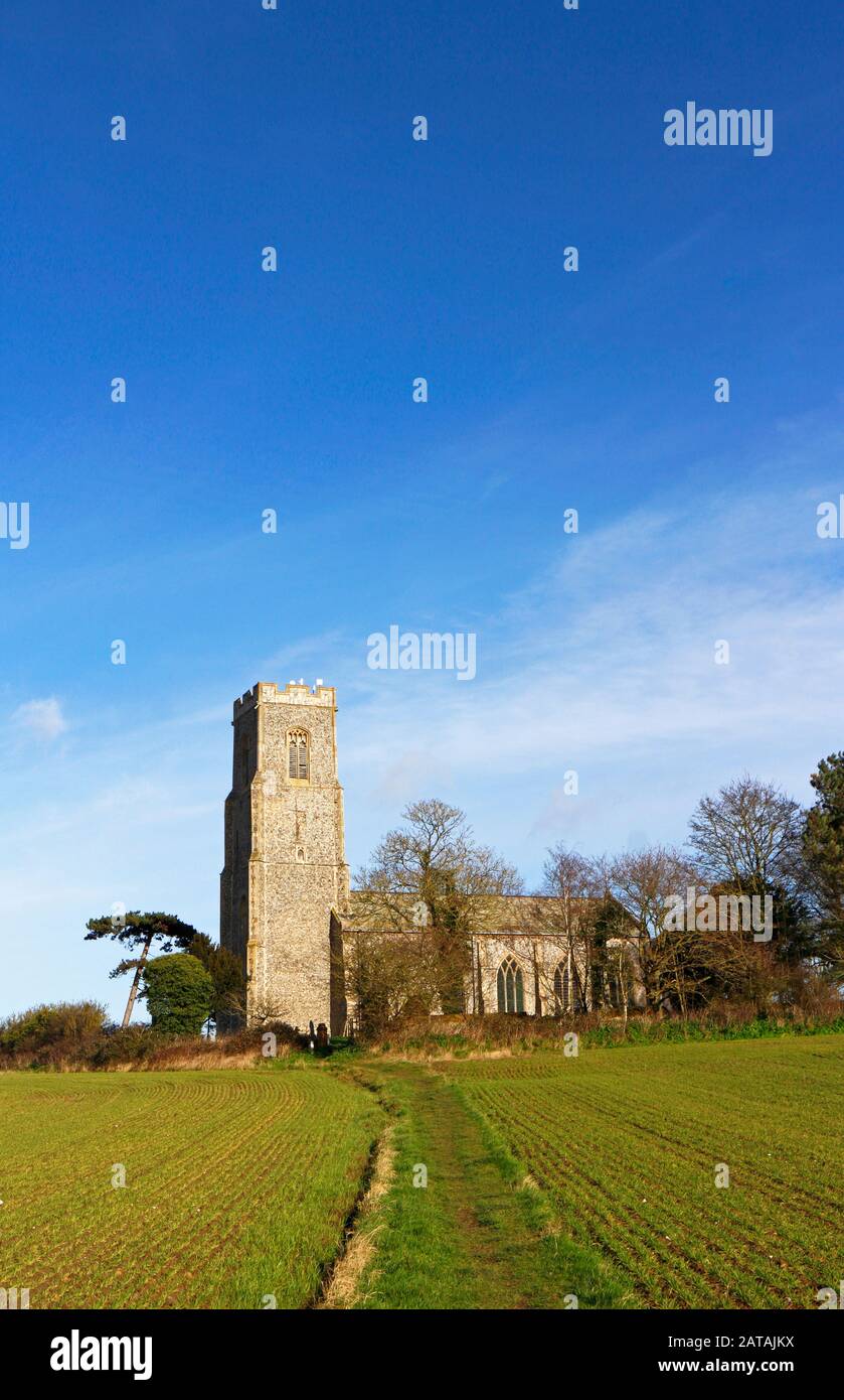 A view from the footpath across the fields to the parish Church of St ...
