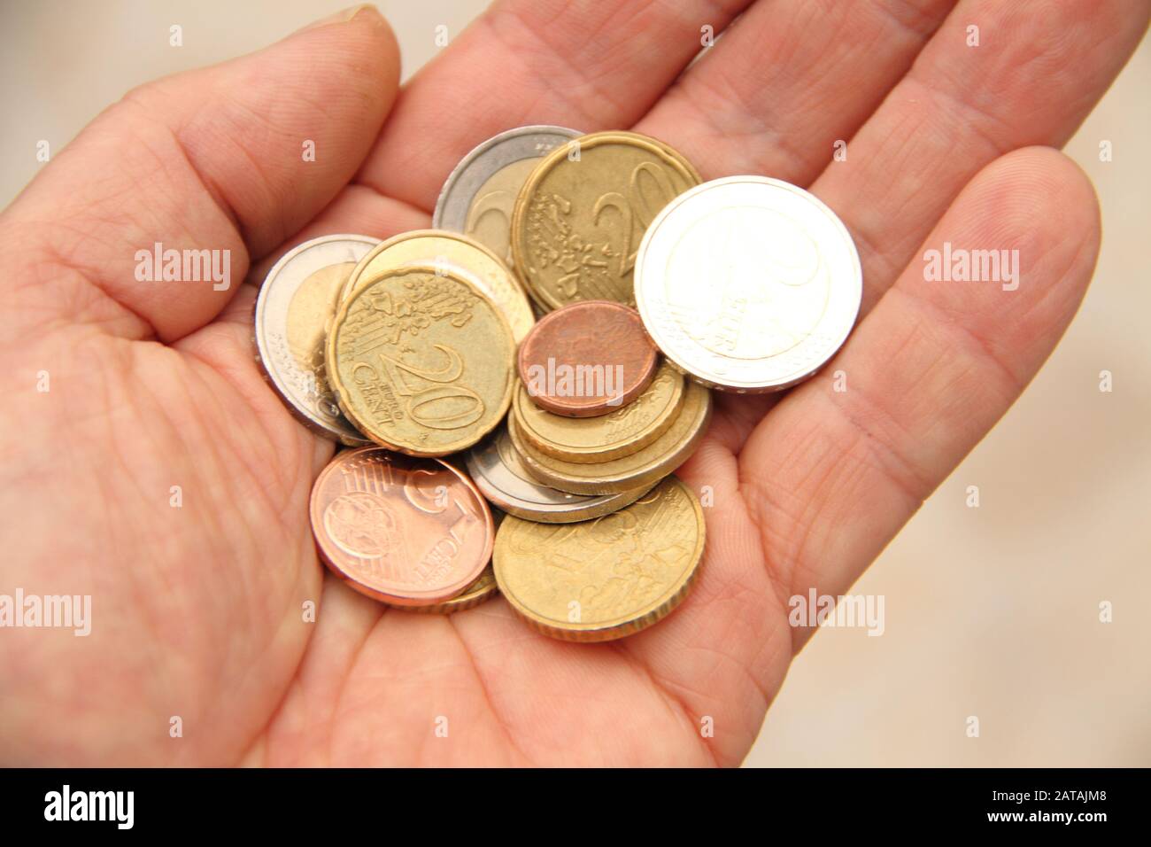 Handful loose change hi-res stock photography and images - Alamy