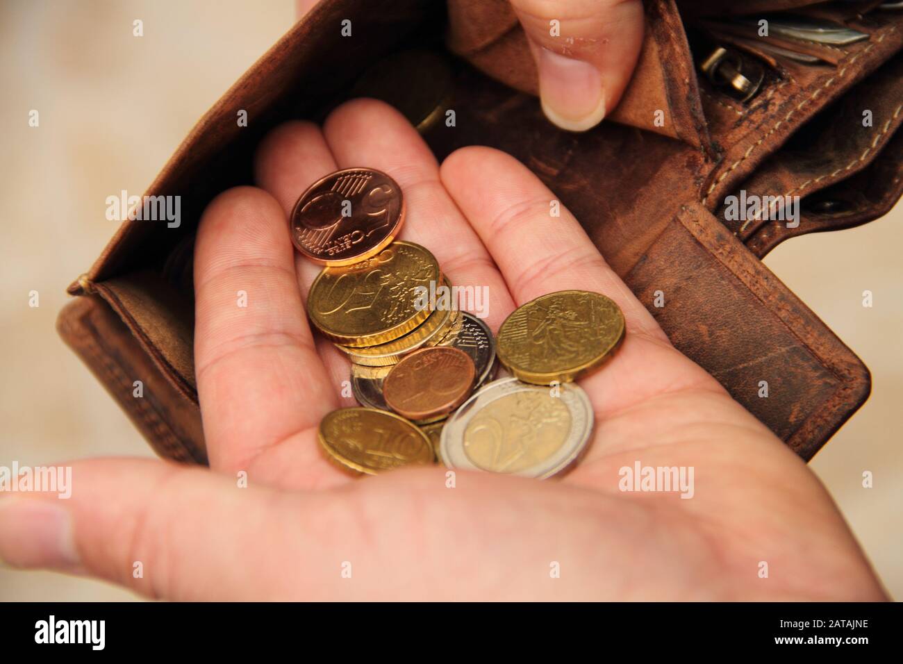 Handful loose change hi-res stock photography and images - Alamy