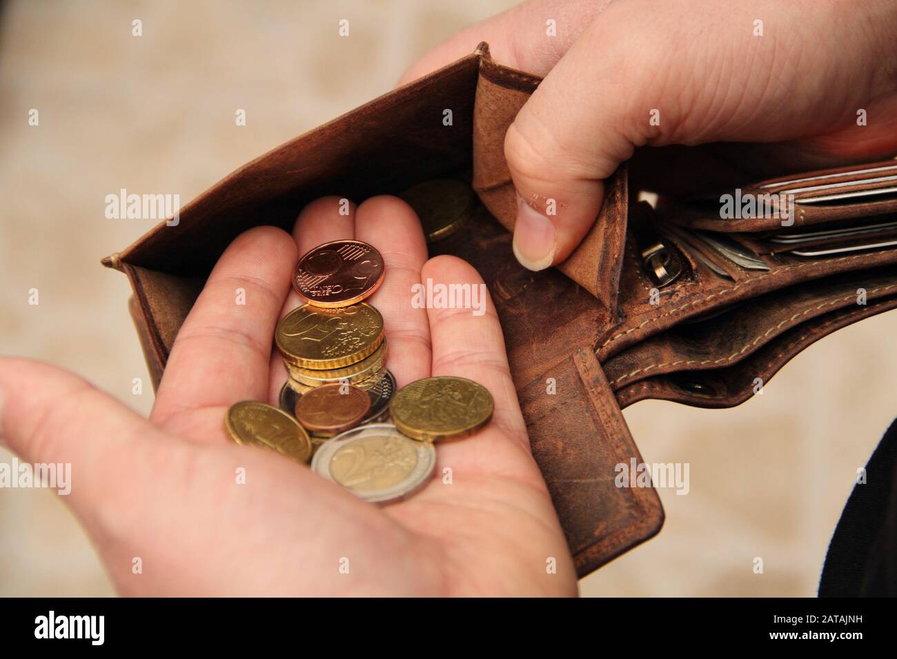 Handful loose change hi-res stock photography and images - Alamy