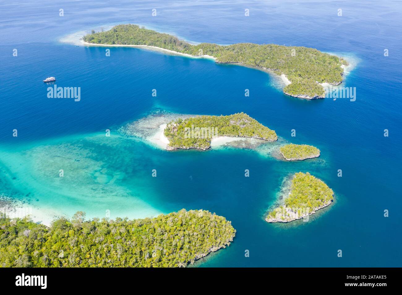 Seen from above, the many tropical islands within Raja Ampat, Indonesia ...