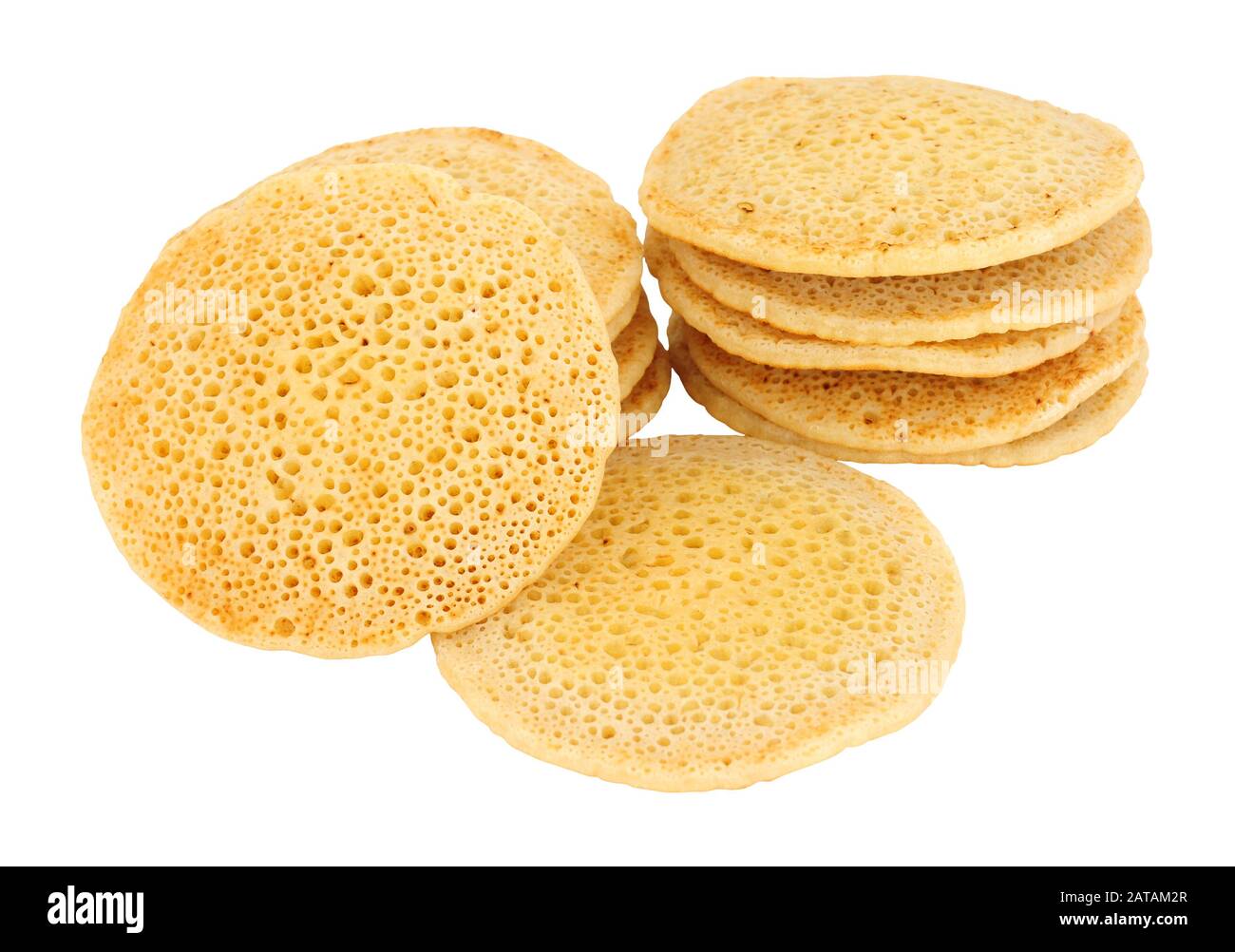 Tradition thin pikelet flat crumpets isolated on a white background ...