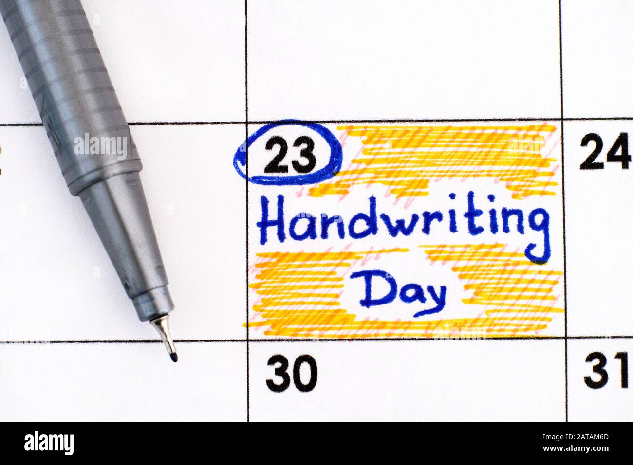 Reminder Handwriting Day in calendar with pen. January 23 Stock Photo ...