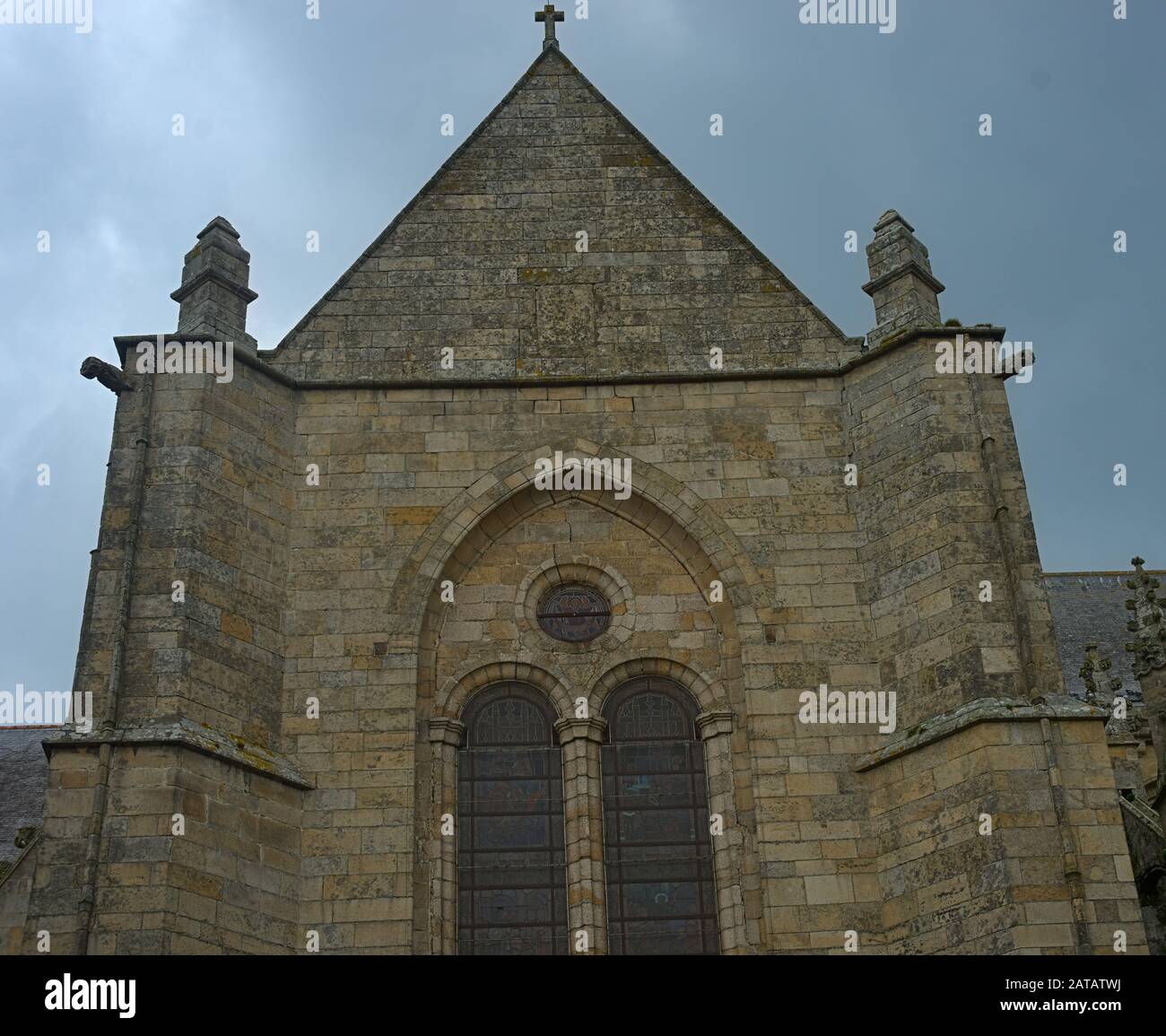 Top of old medieval stone catholic church in Dinan, France Stock Photo ...