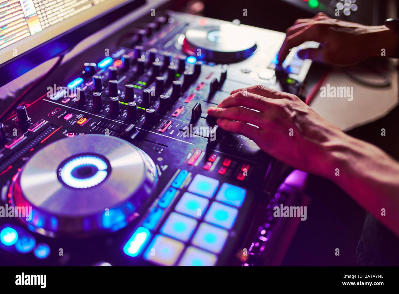 Dj mixes the track in the nightclub at a party Stock Photo - Alamy